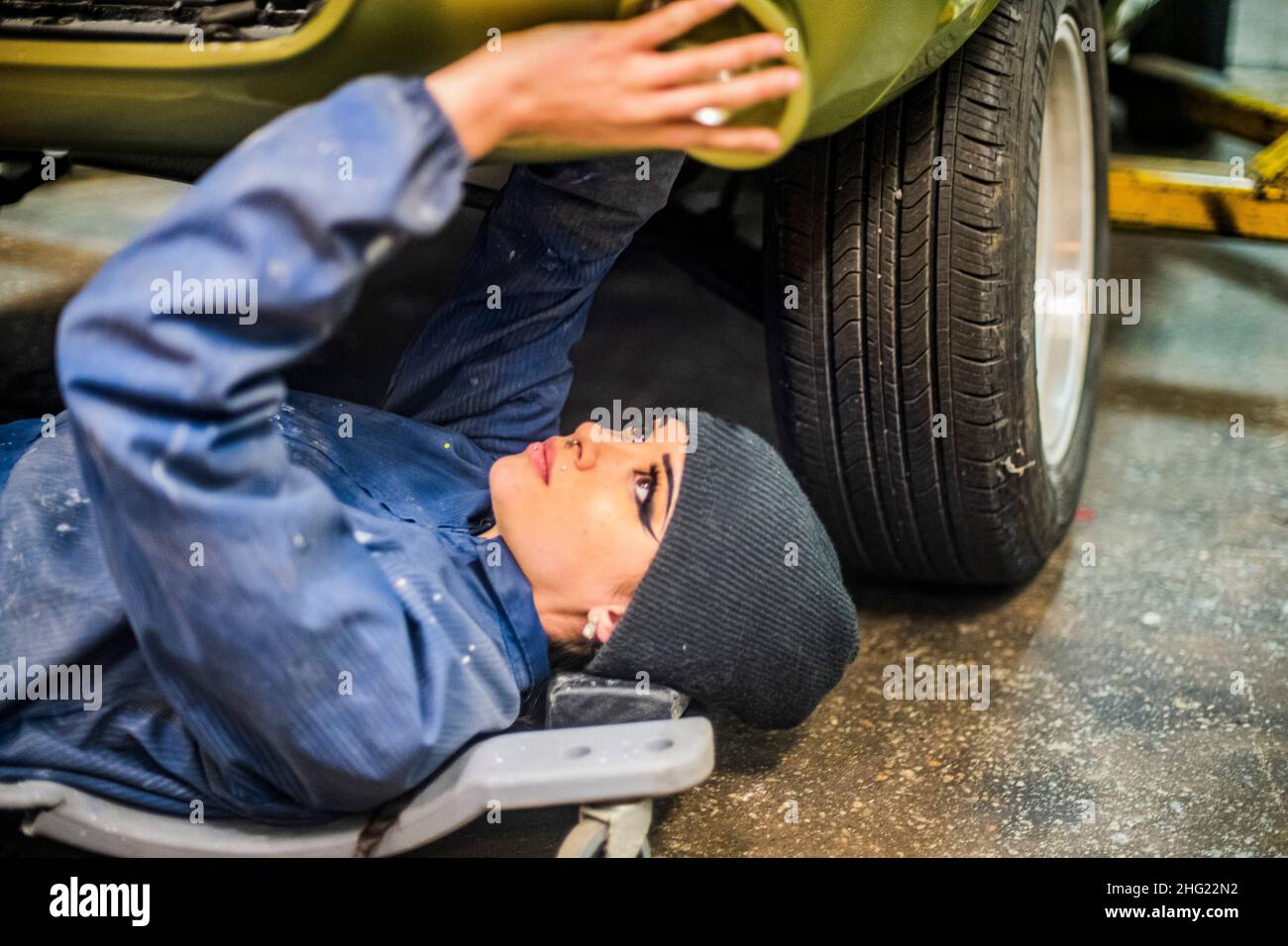 Female mechanic under car hi-res stock photography and images - Alamy