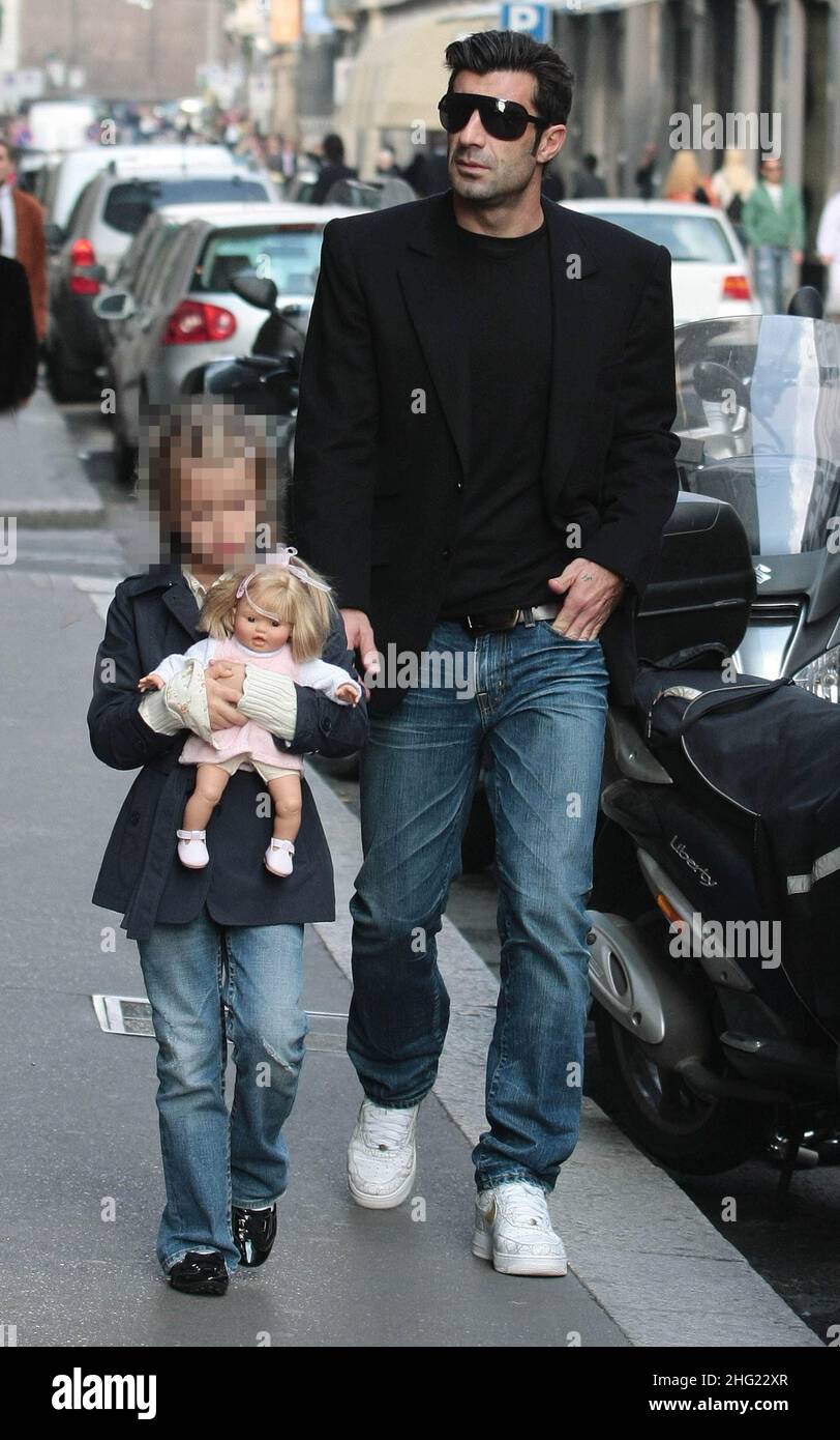 Luis Figo with daughter and wife Helen Svedin shopping in Milan Stock ...