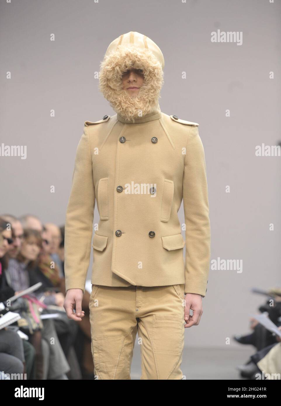A model on the catwalk wears a design by Gaetano Navarra during the ...