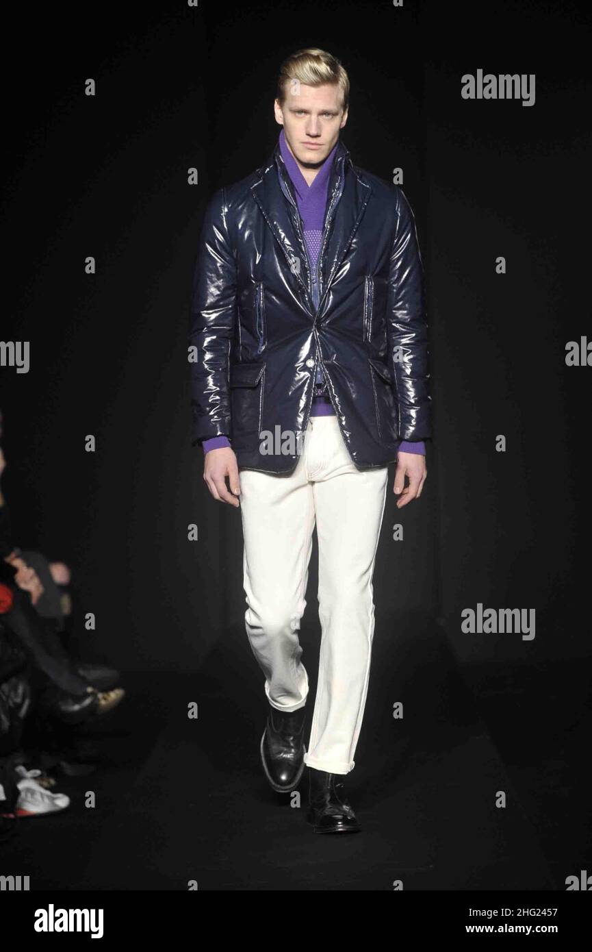 A model on the catwalk wears a design by Enrico Coveri during the Milan ...