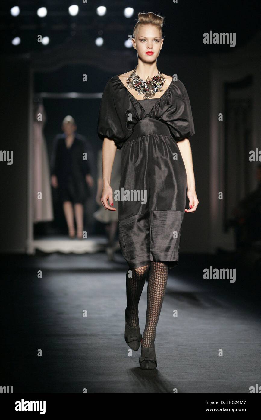 A model on the cat walk wears a design by Moschino during Milan Fashion ...