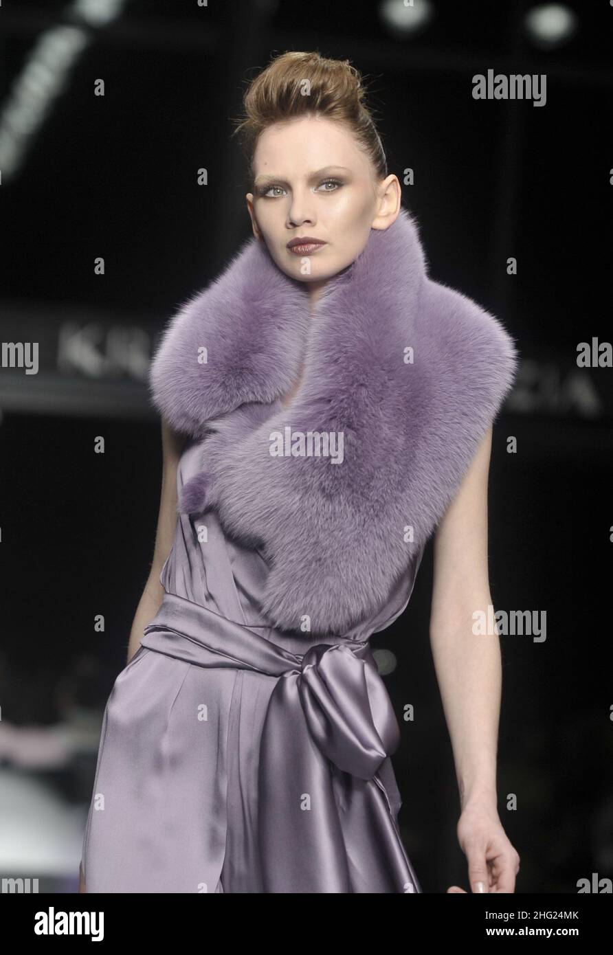 A model on the cat walk wears a design by Krizia during Milan Fashion ...