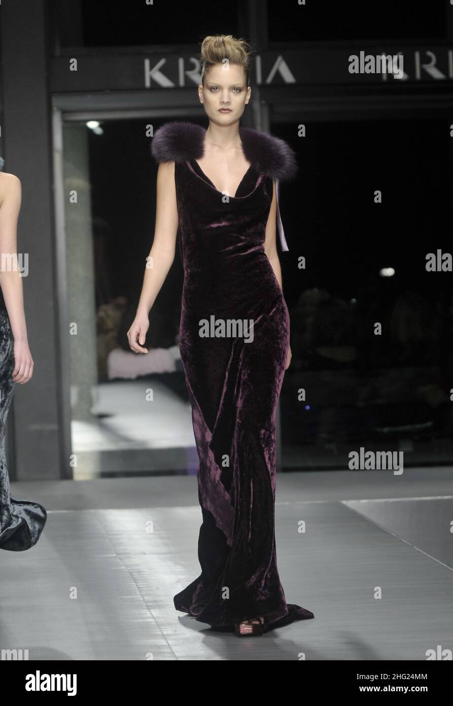 A model on the cat walk wears a design by Krizia during Milan Fashion ...
