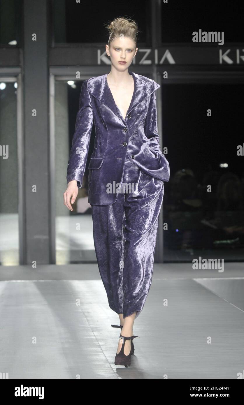 A model on the cat walk wears a design by Krizia during Milan Fashion ...