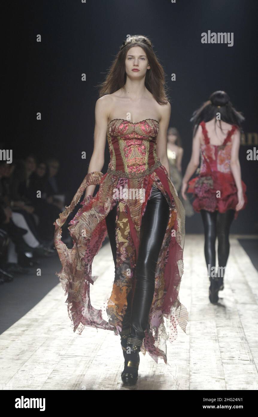 A model on the cat walk wears a design by Angelo Marani during Milan ...