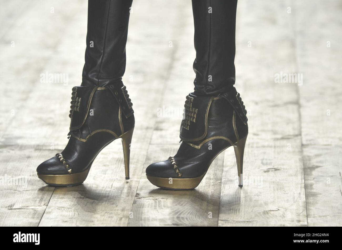 A model on the cat walk wears a design by Angelo Marani during Milan ...