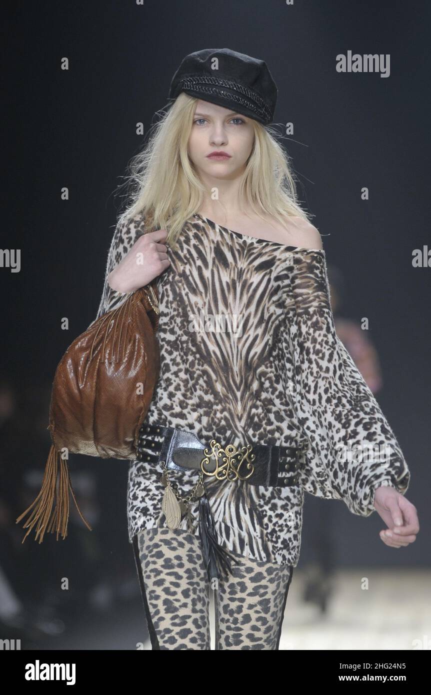 A model on the cat walk wears a design by Angelo Marani during Milan ...