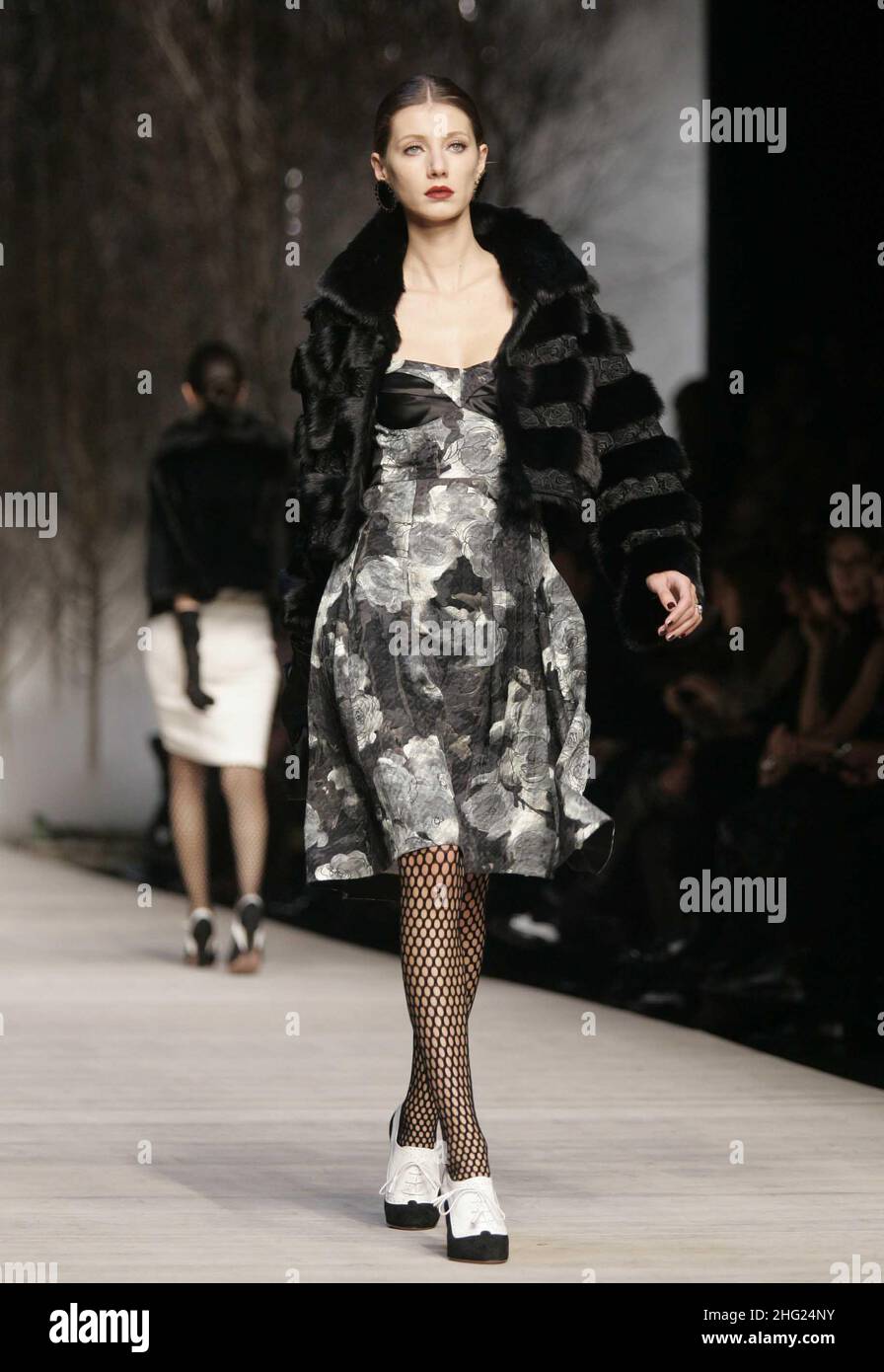 A model on the cat walk wears a design by Mariella Burani during Milan ...