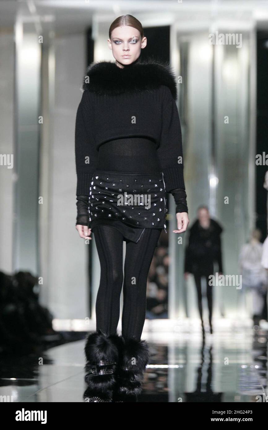 A model on the cat walk wears a design by Roberto Cavalli during Milan ...