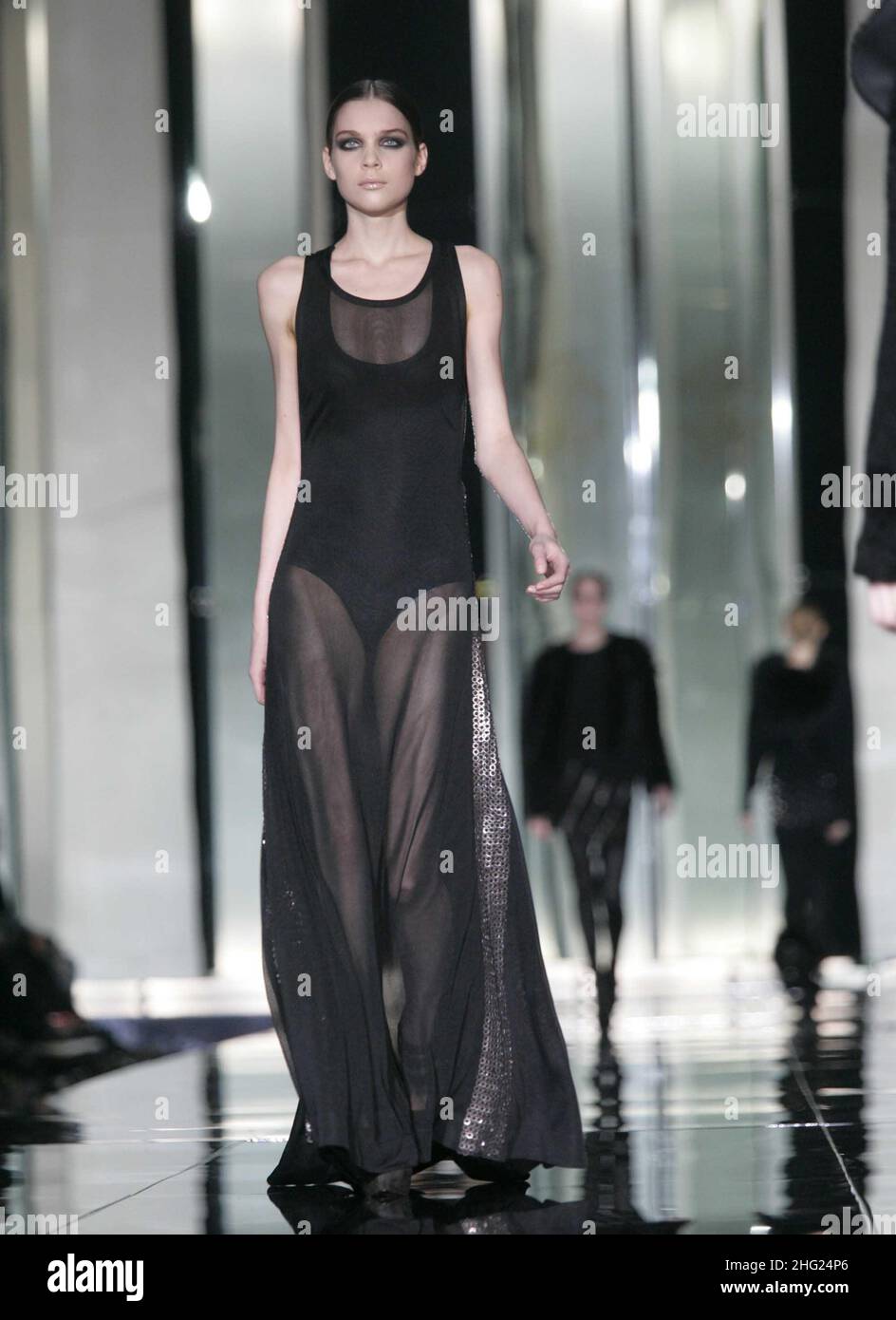 A model on the cat walk wears a design by Roberto Cavalli during Milan ...