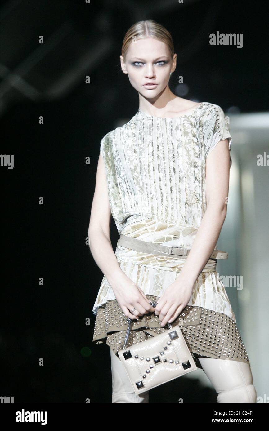 A model on the cat walk wears a design by Roberto Cavalli during Milan ...