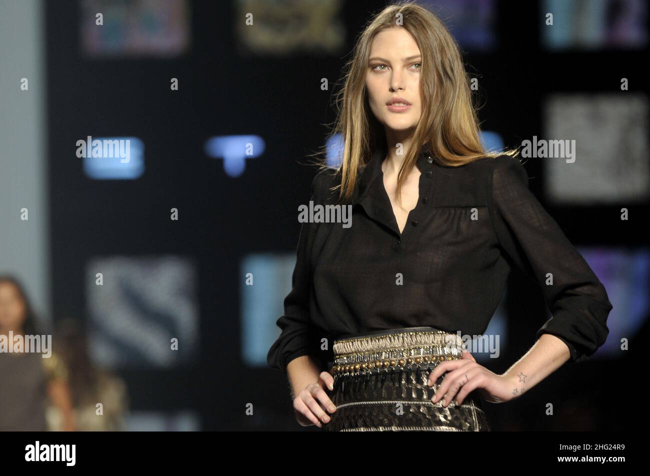 A model on the cat walk wears a design by Etro during Milan Fashion ...