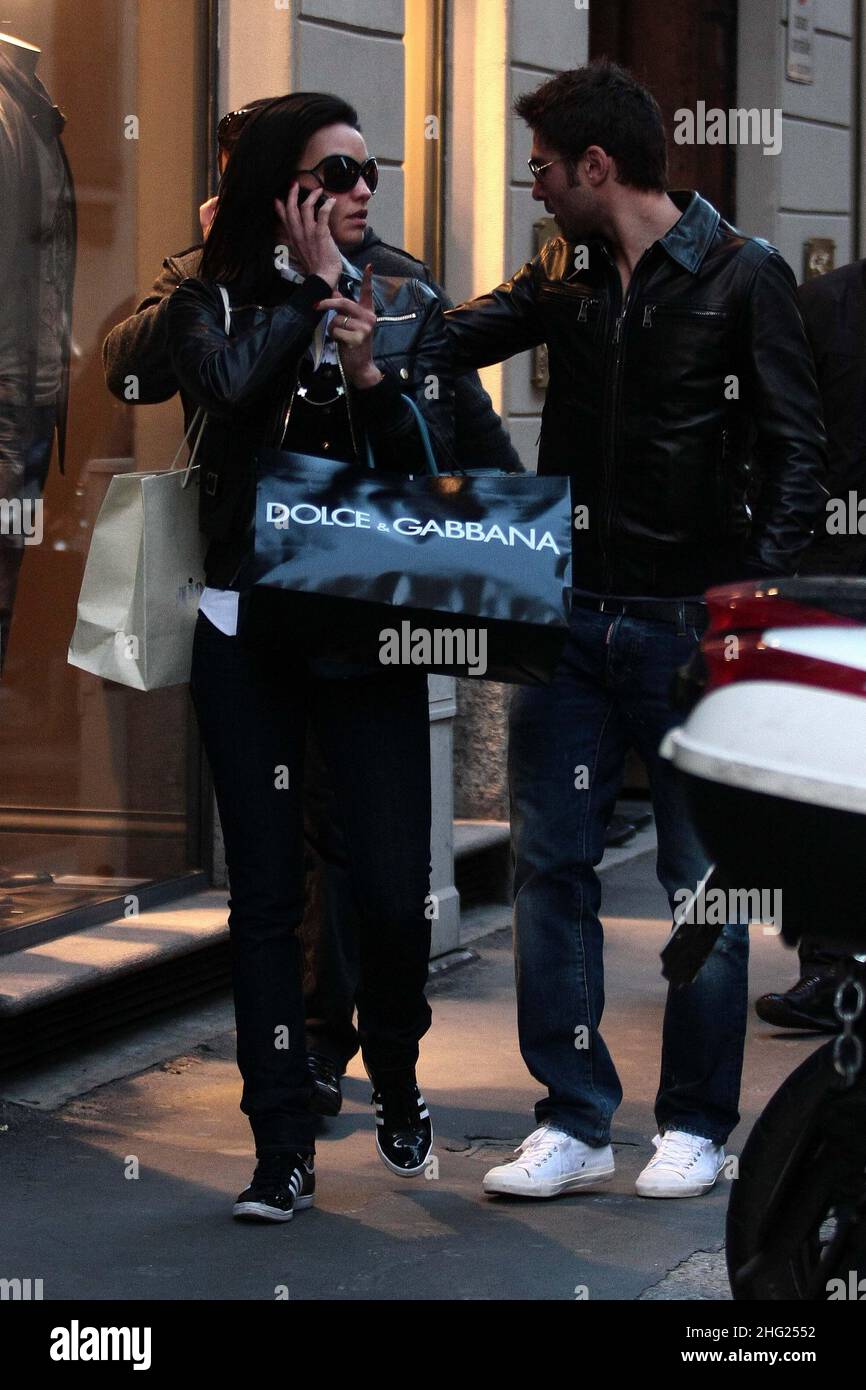 Footballer Adrian Mutu and his wife Consuelo spotted shopping in Milan ...