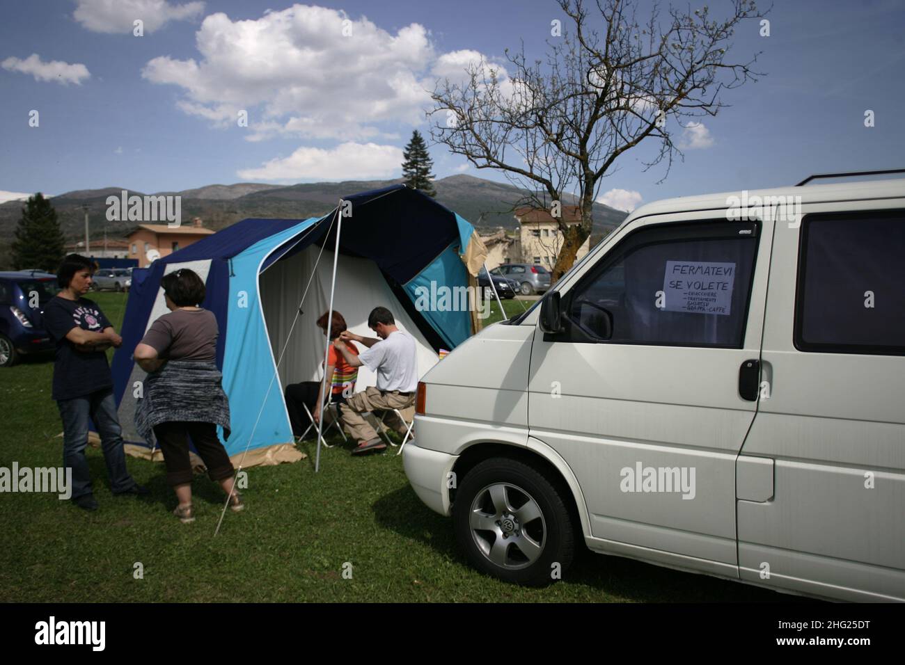 Massages are offered to survivors of the L'Aquila earthquake on the car ...