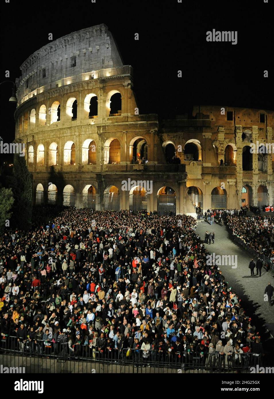 A crowd gathers by the ancient Colosseum prior to the start of the Good ...