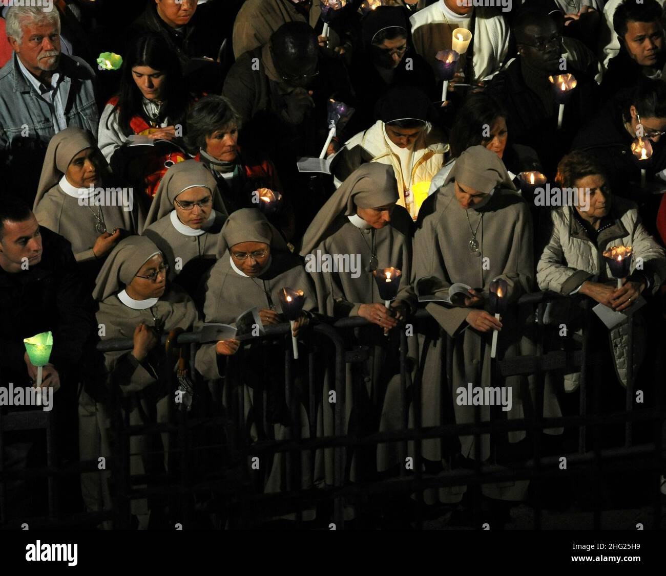 A crowd gathers by the ancient Colosseum prior to the start of the Good ...