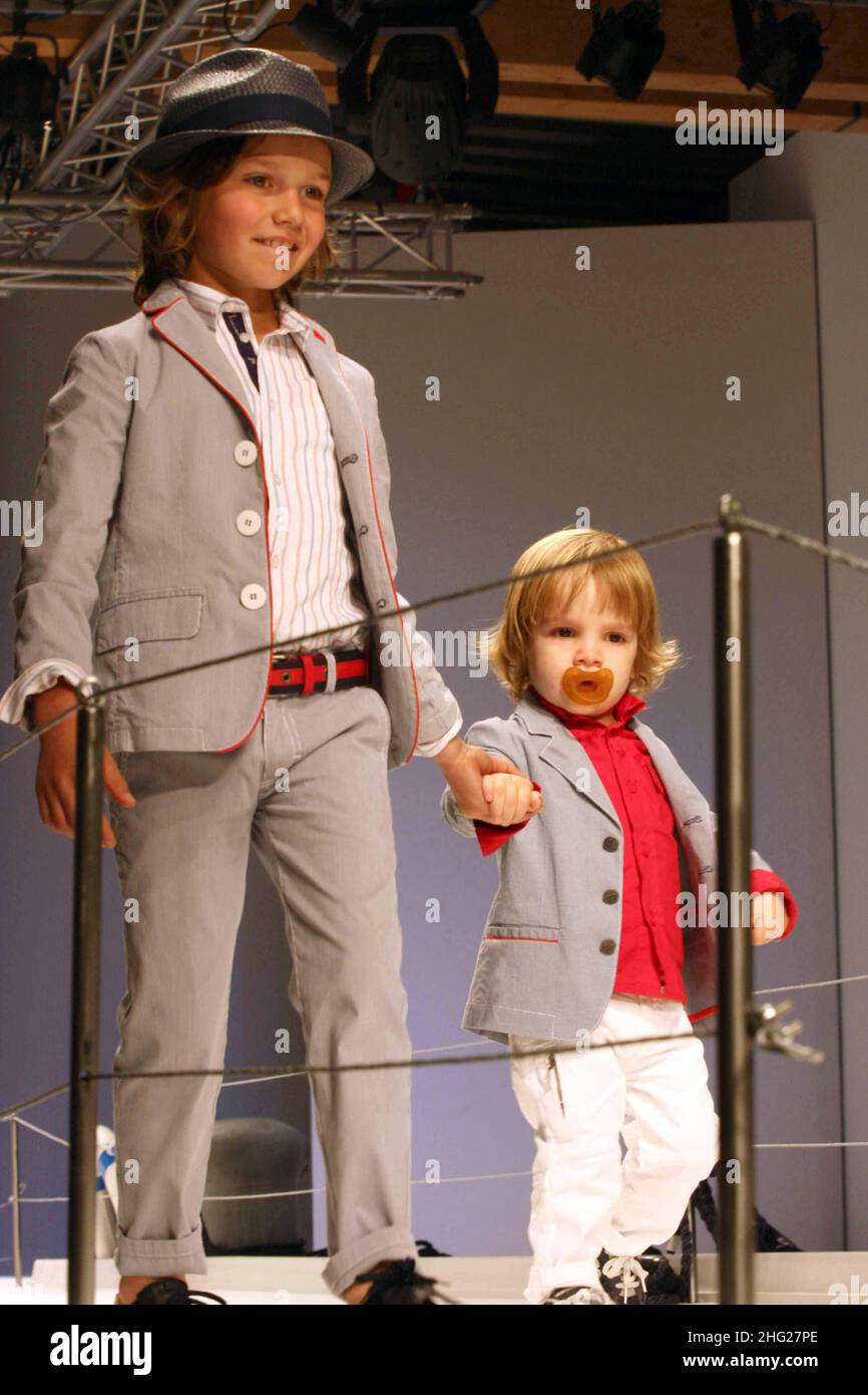 Models on the catwalk at the Pitti Children's Fashion Show in Florence ...