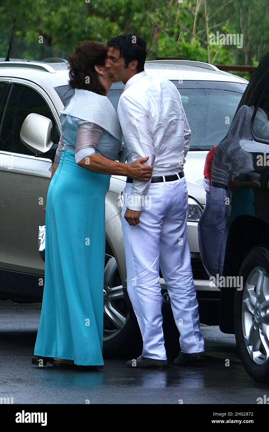 Italian footballer Gigi Buffon and his family attending the wedding of ...