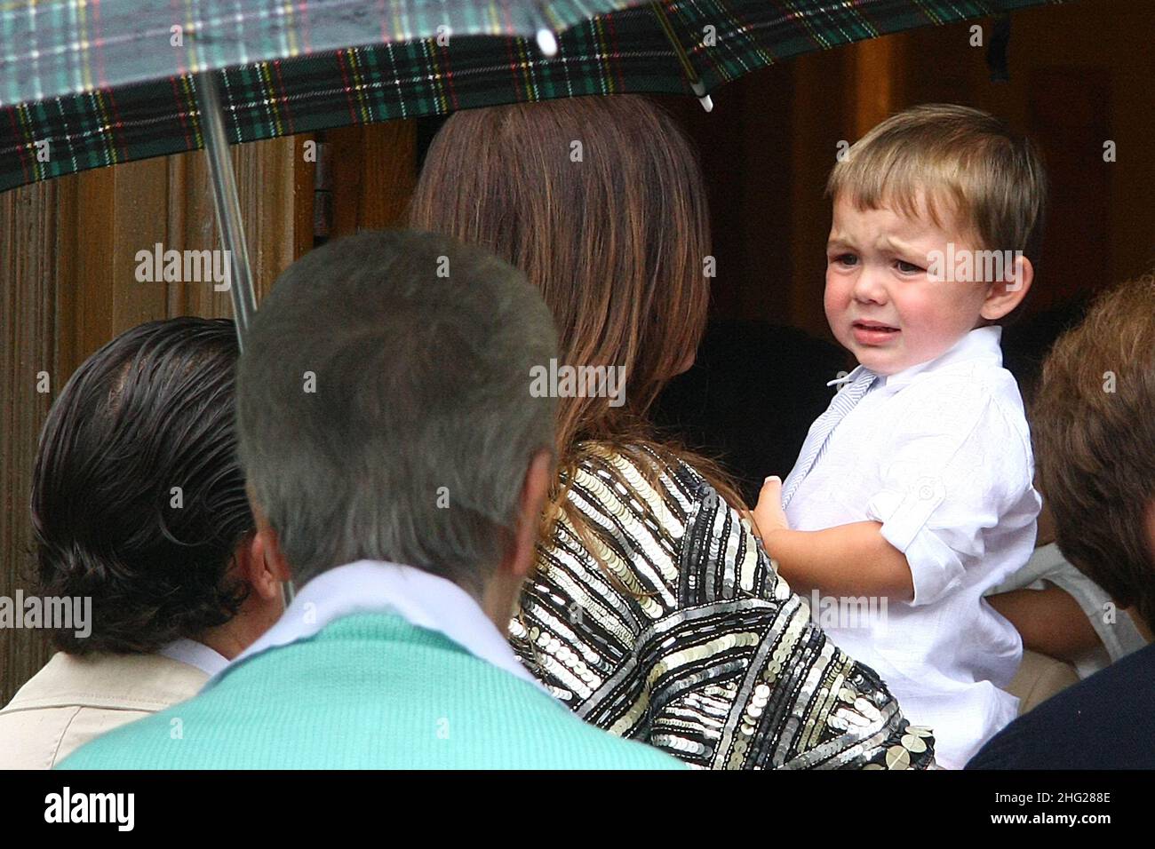 Italian footballer Gigi Buffon and his family attending the wedding of ...