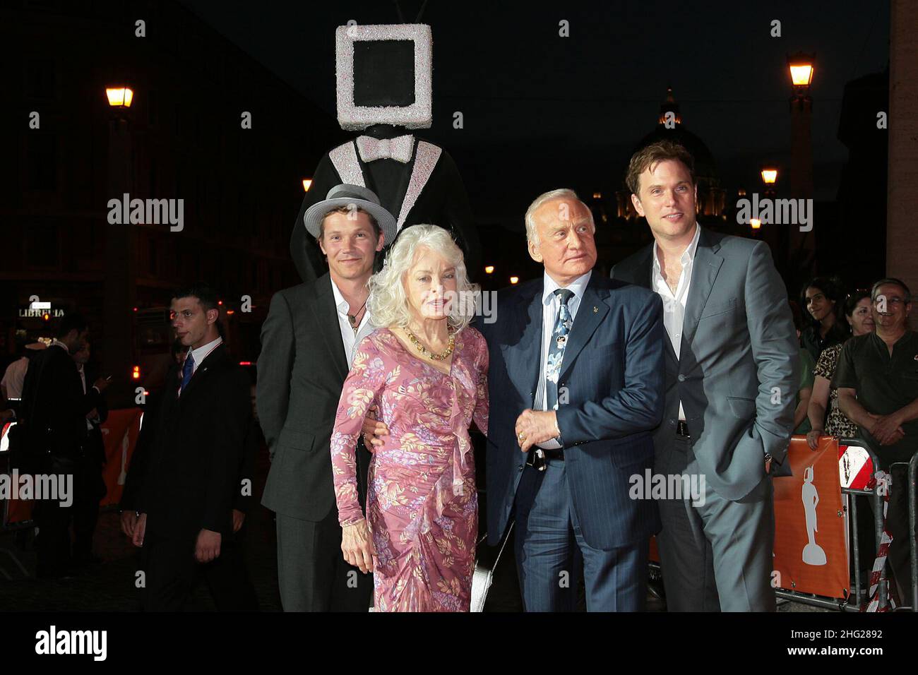 Buzz Aldrin, his wife Lois Driggs Cannon, Daniel Lapaine and Richard ...