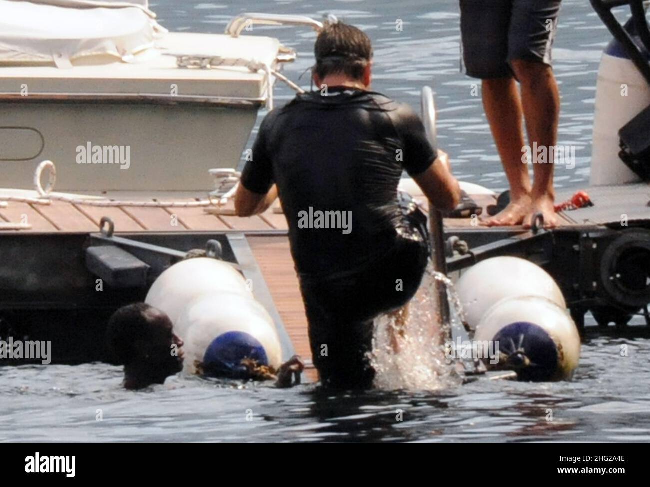 Matt Damon and Don Cheadle with his family are seen on holiday at Lake ...