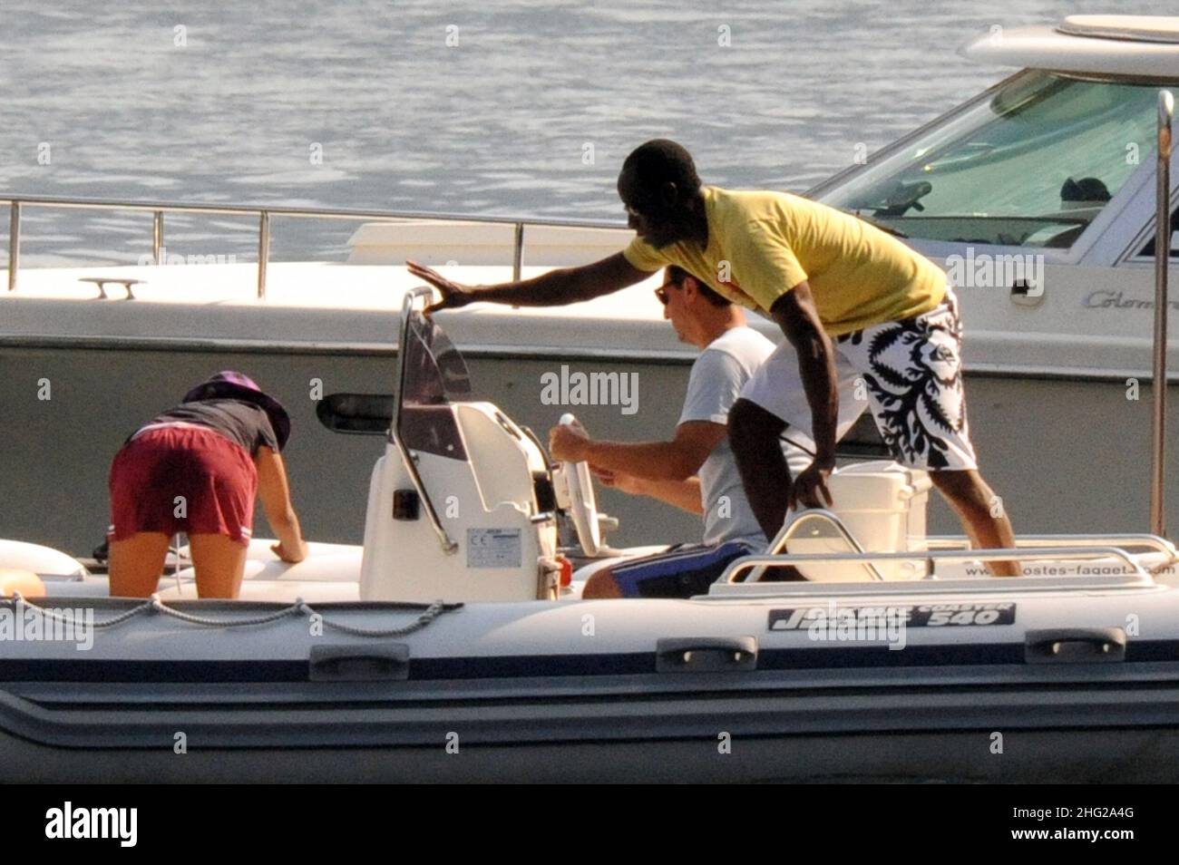 Matt Damon and Don Cheadle with his family are seen on holiday at Lake ...