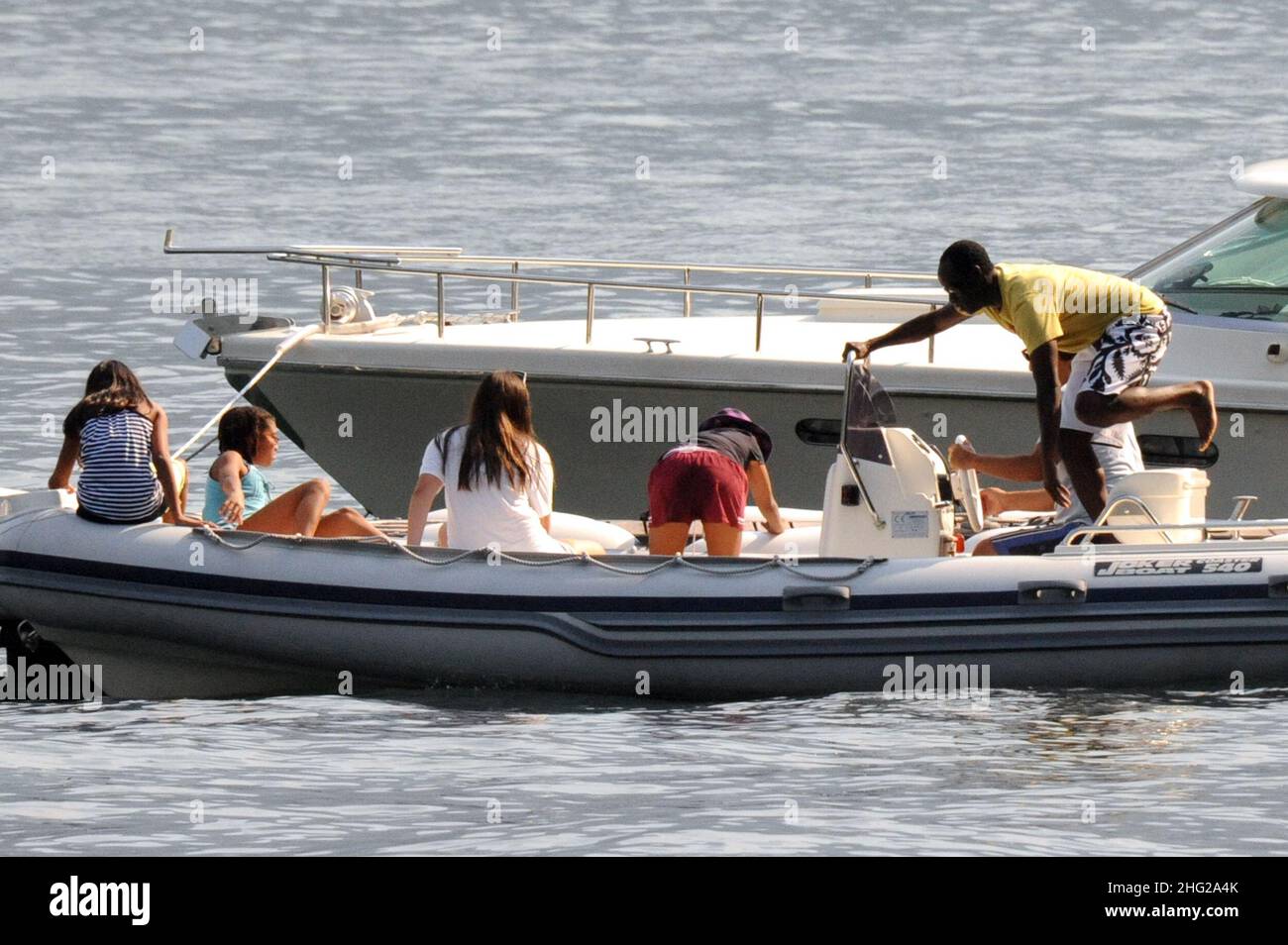 Matt Damon and Don Cheadle with his family are seen on holiday at Lake ...