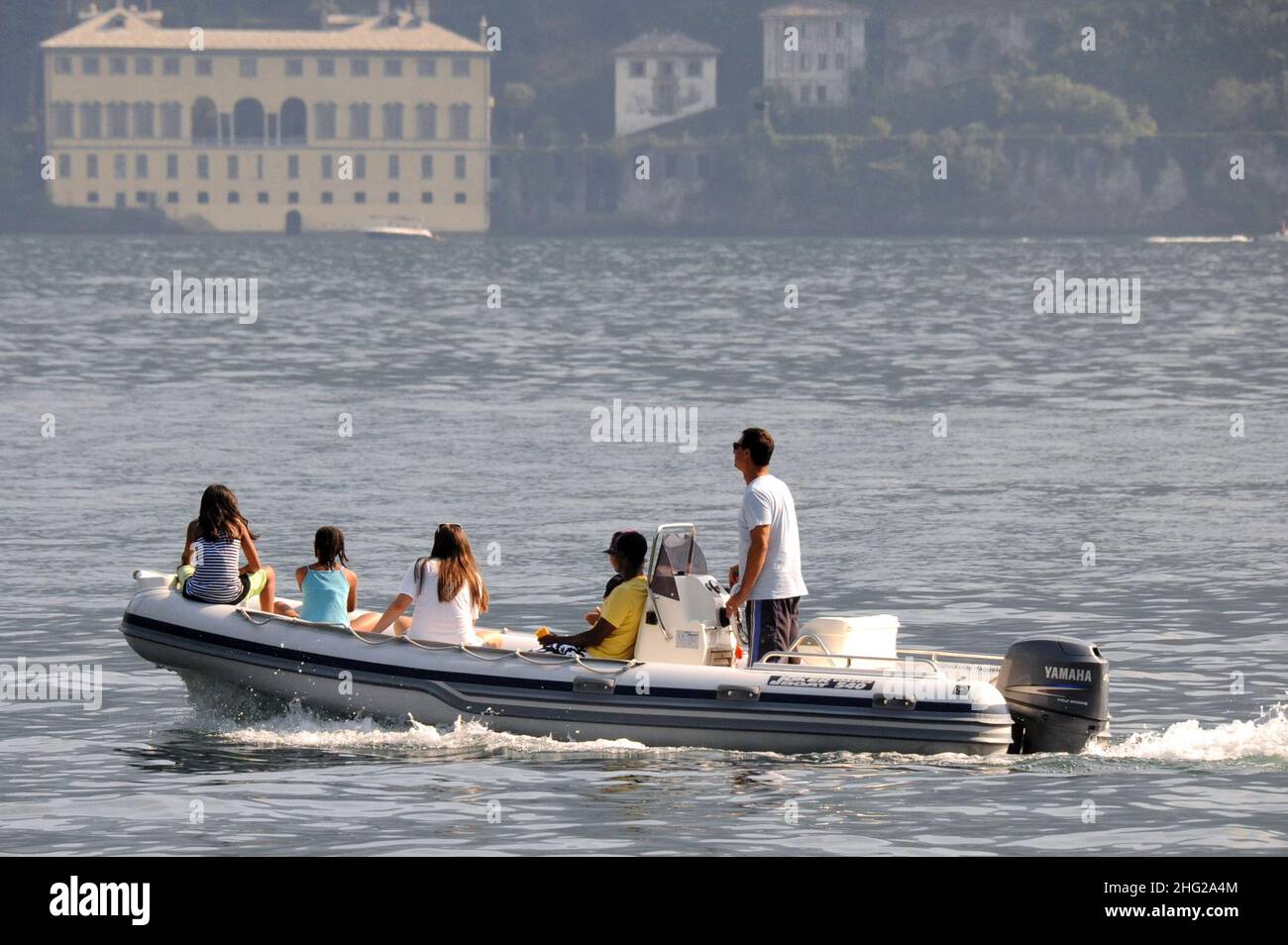 Matt Damon and Don Cheadle with his family are seen on holiday at Lake ...