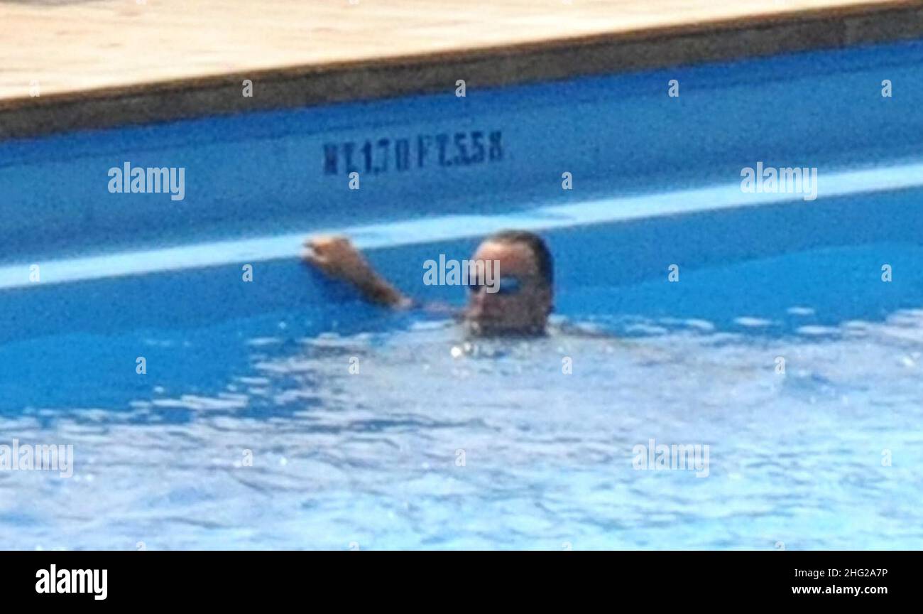 Bruce Springsteen is seen swimming in the pool on holiday in Villa d ...