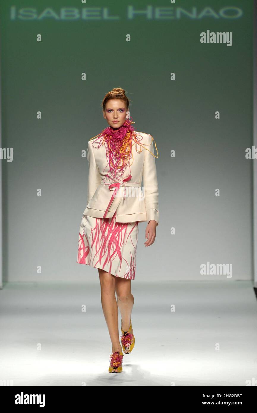 A model on the catwalk wears a creation by Isabel Henao during the ...