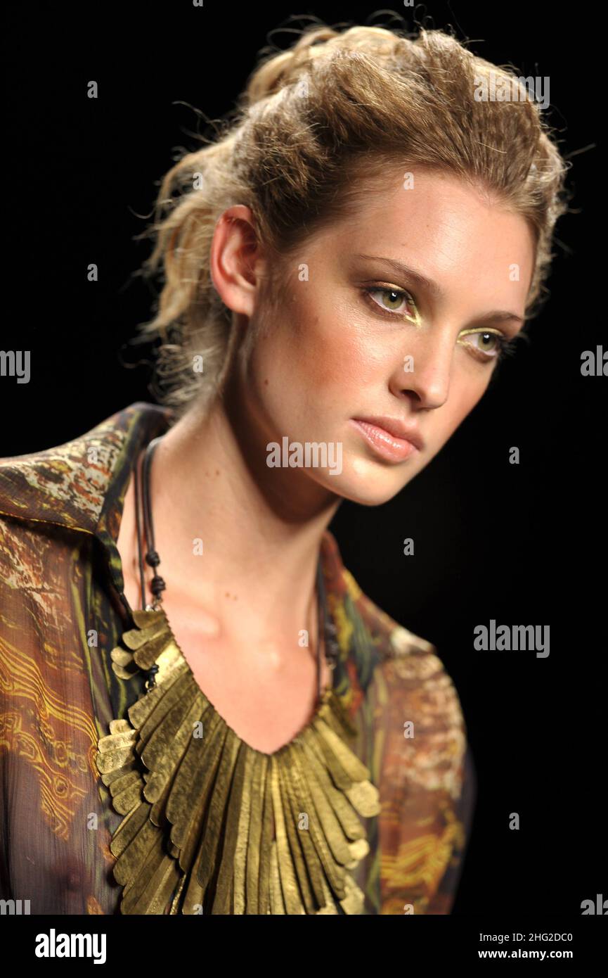 A model on the catwalk wears a creation by Beatriz Camacho during the ...