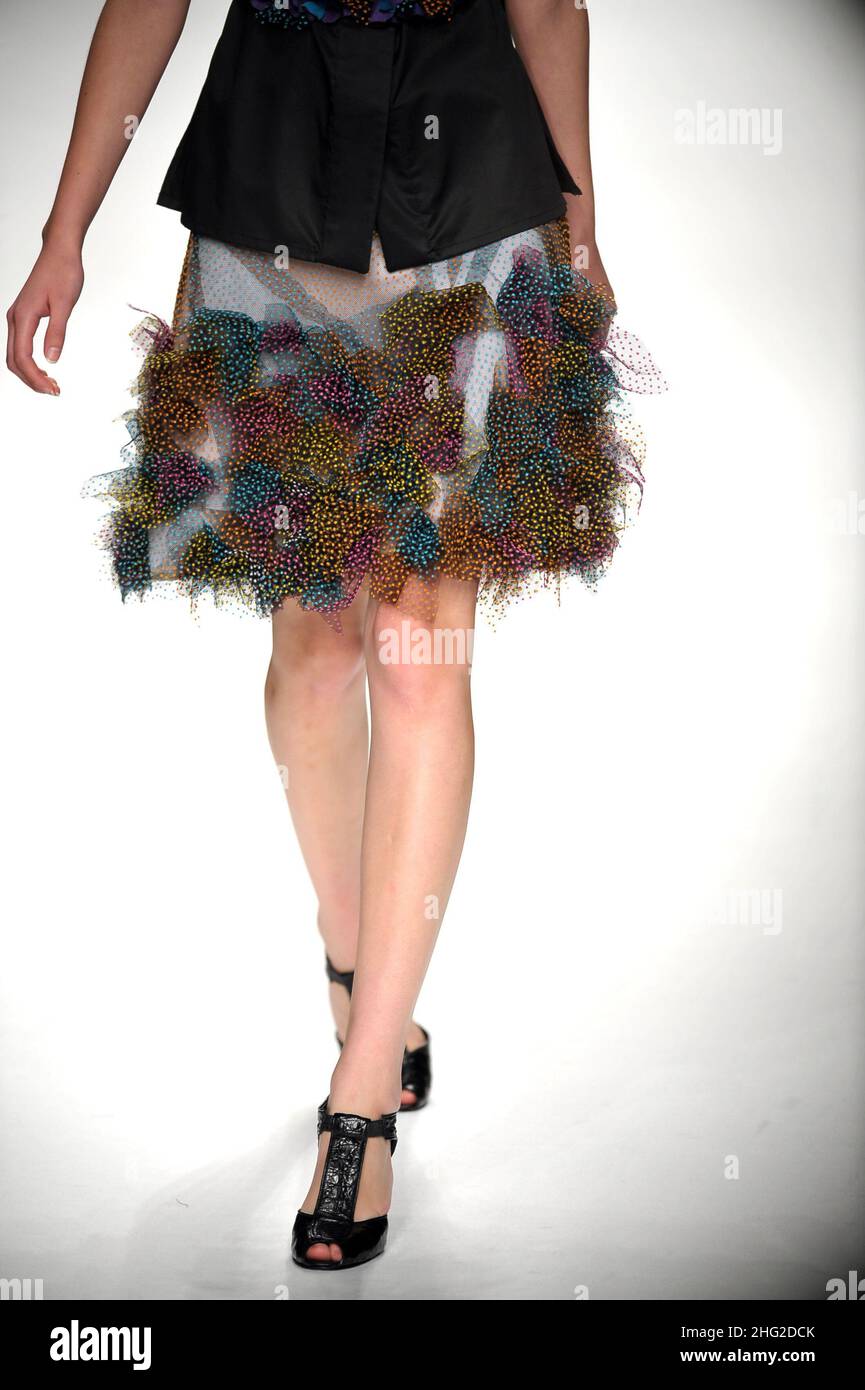 A model on the catwalk wears a creation by Isabel Henao during the ...