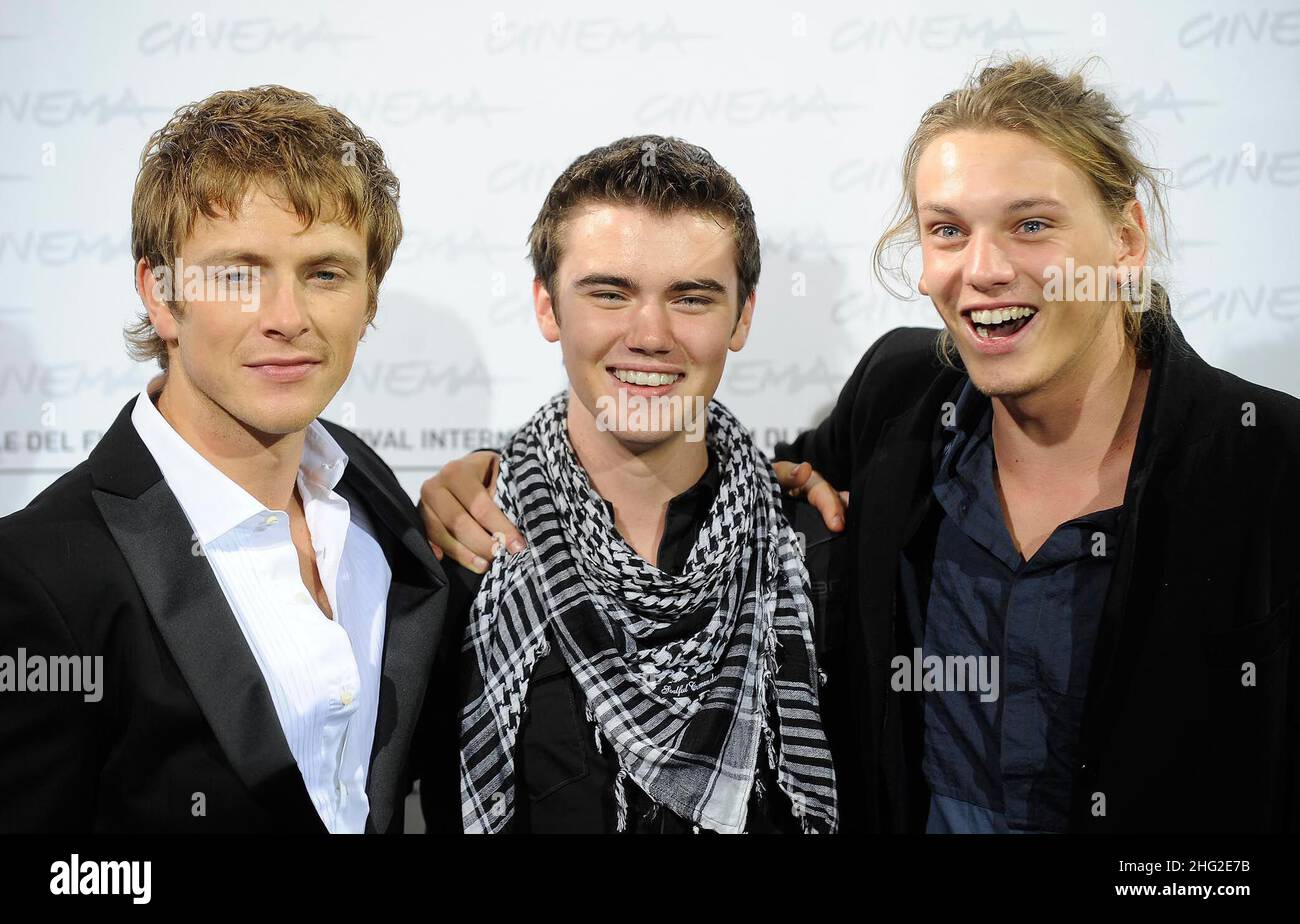 Charlie Bewley, Cameron Bright and Jamie Campbell Bower pose during a ...