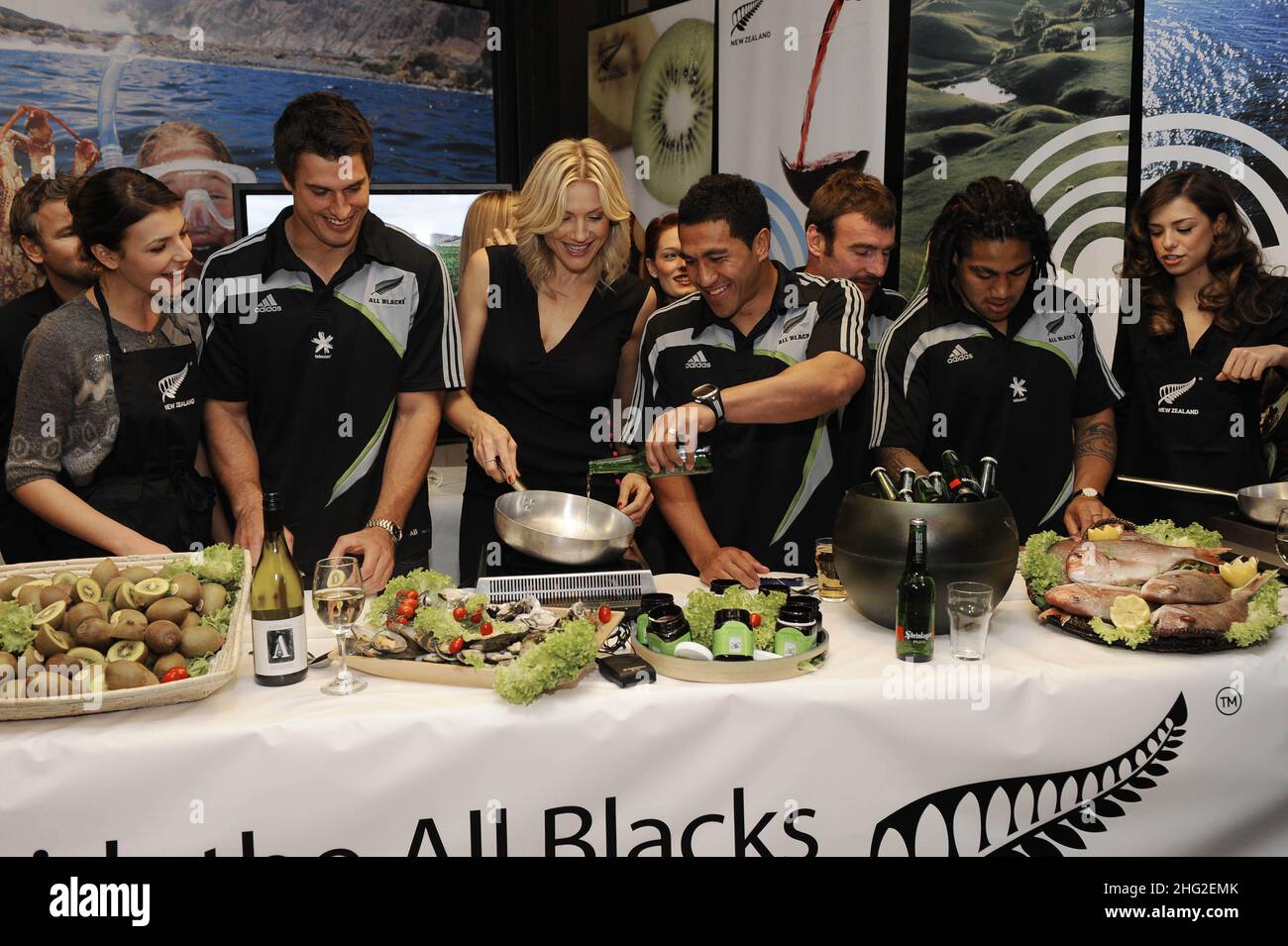 Rugby team the New Zealand All Blacks chef for a day with the girls of ...