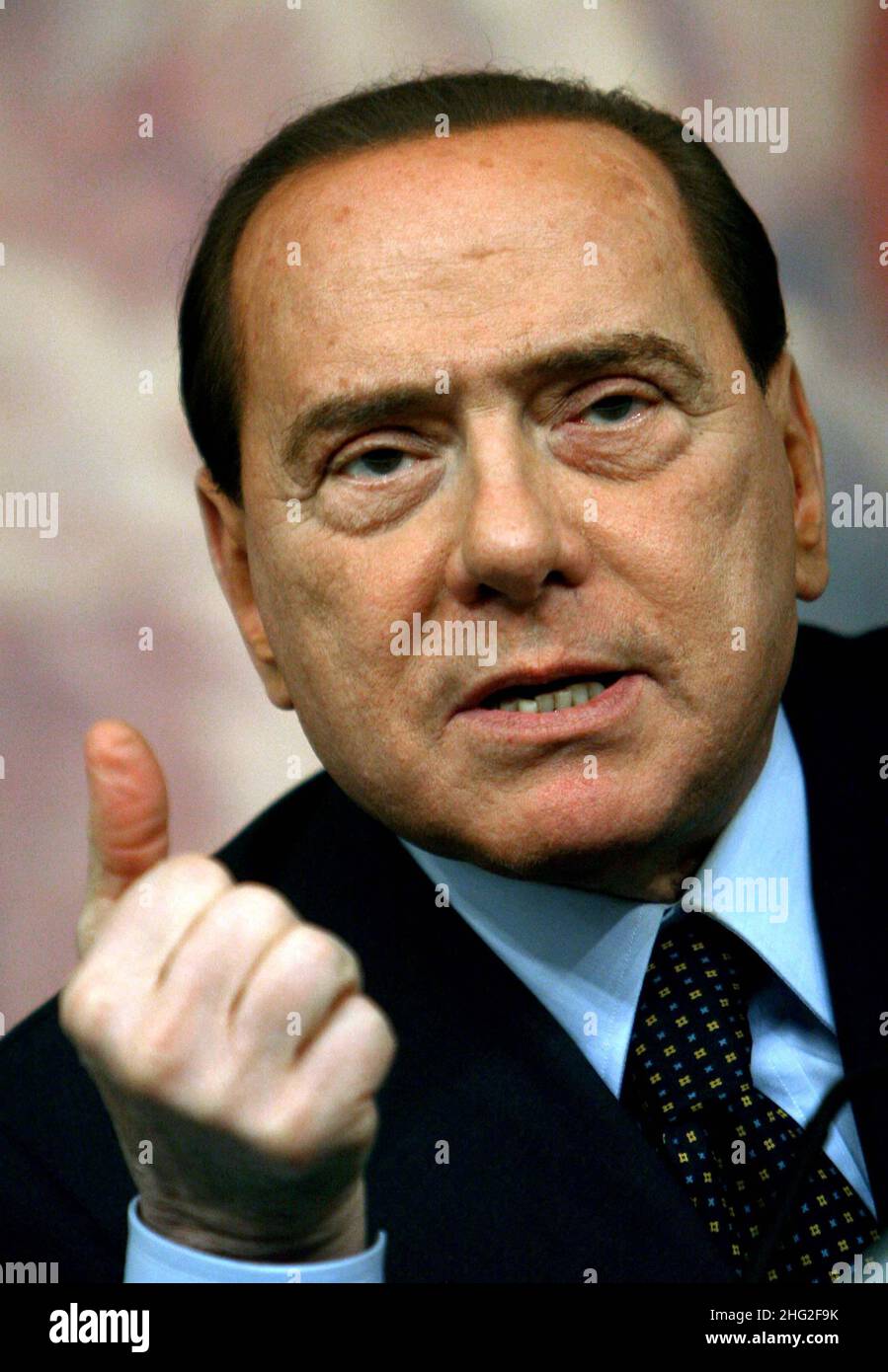 Italian Premier Silvio Berlusconi speaks during a press conference ...
