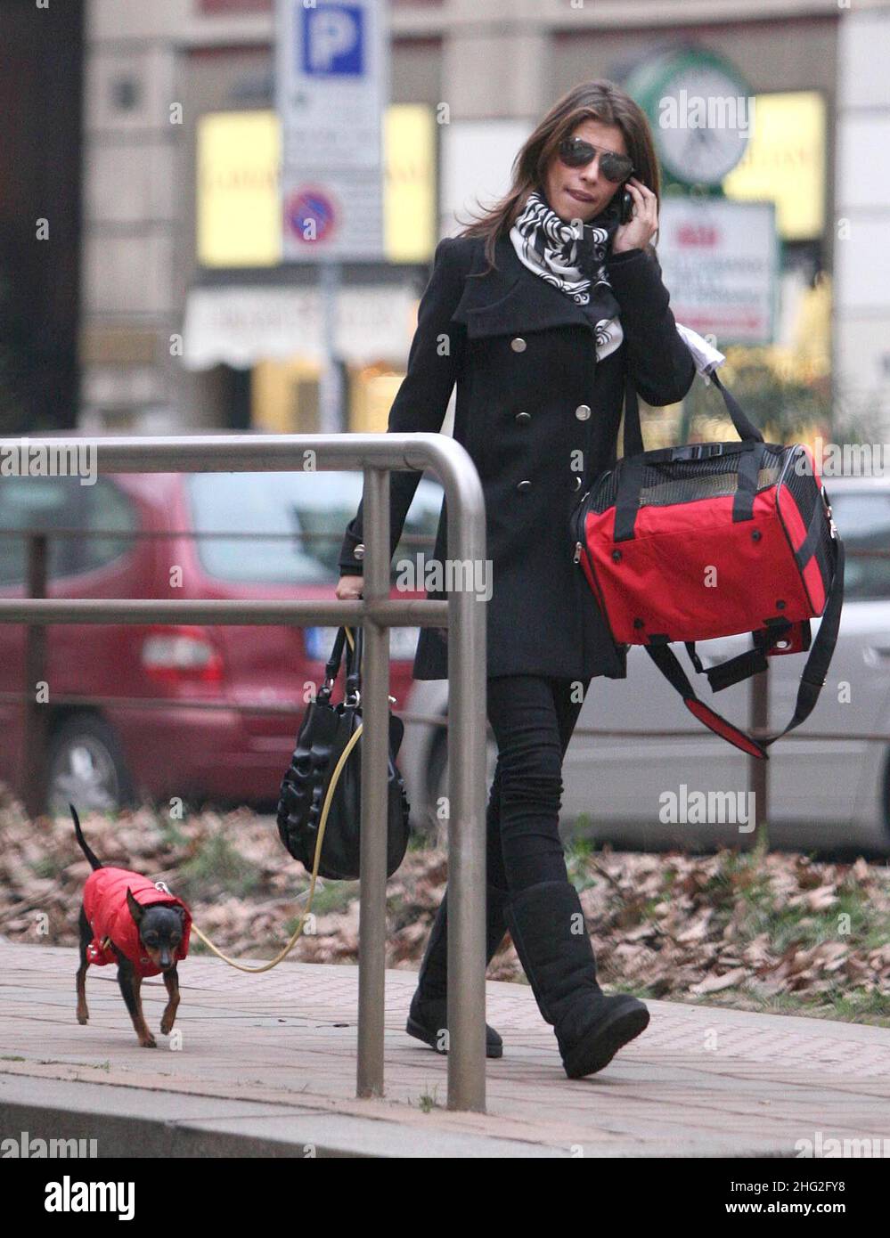 Italian model Elisabetta Canalis is seen walking her dog on the streets ...