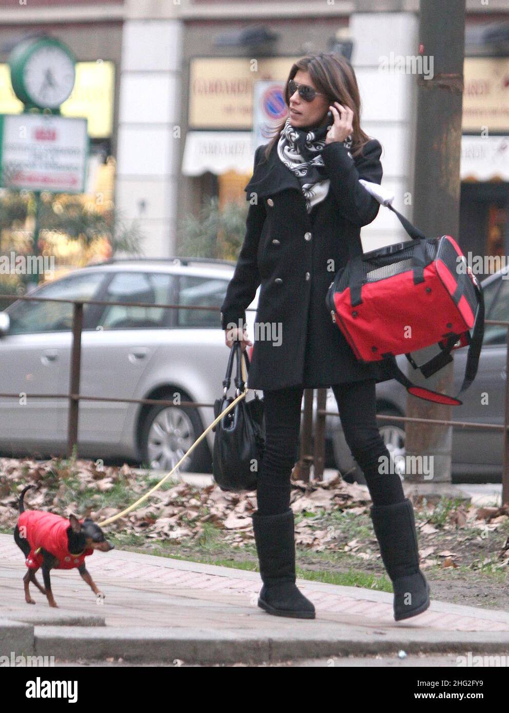 Italian model Elisabetta Canalis is seen walking her dog on the streets ...
