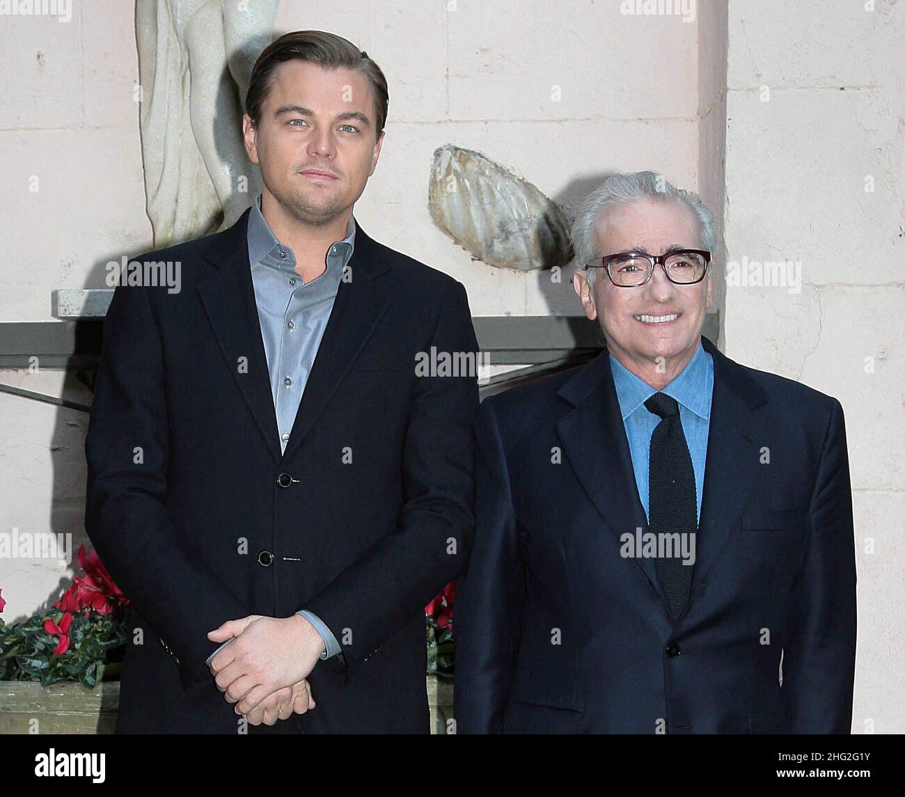 Director Martin Scorsese and actor Leonardo DiCaprio pose during a photocall for their new movie ...