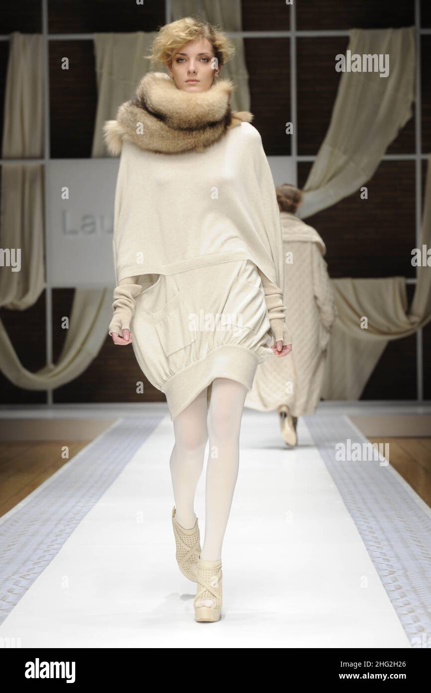A model walks the catwalk during the Laura Biagiotti fashion show as ...