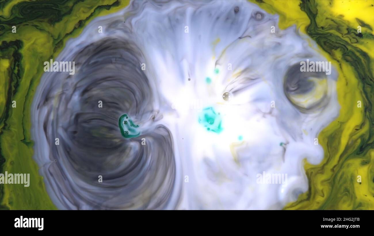 Colorful background of ink reaction to soap drops. Colored inks react ...