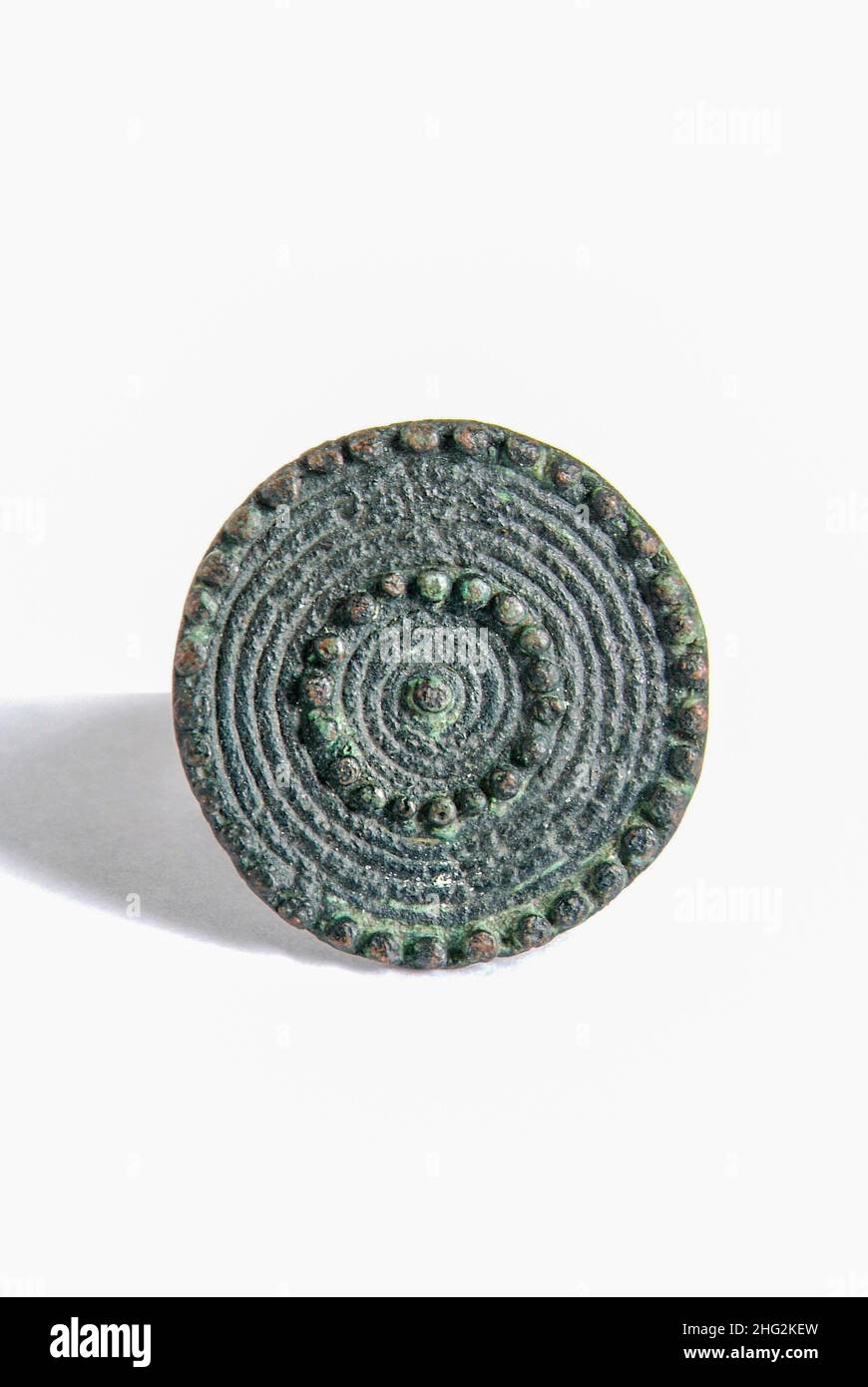 Ancient Persia. A bronze figure ring with large circular bezel ...