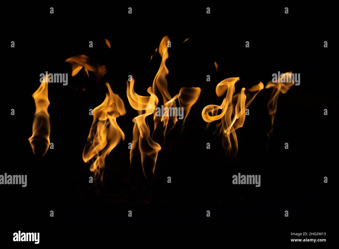 Abstract patterns created by natural gas-fed flame patterns at outdoor ...