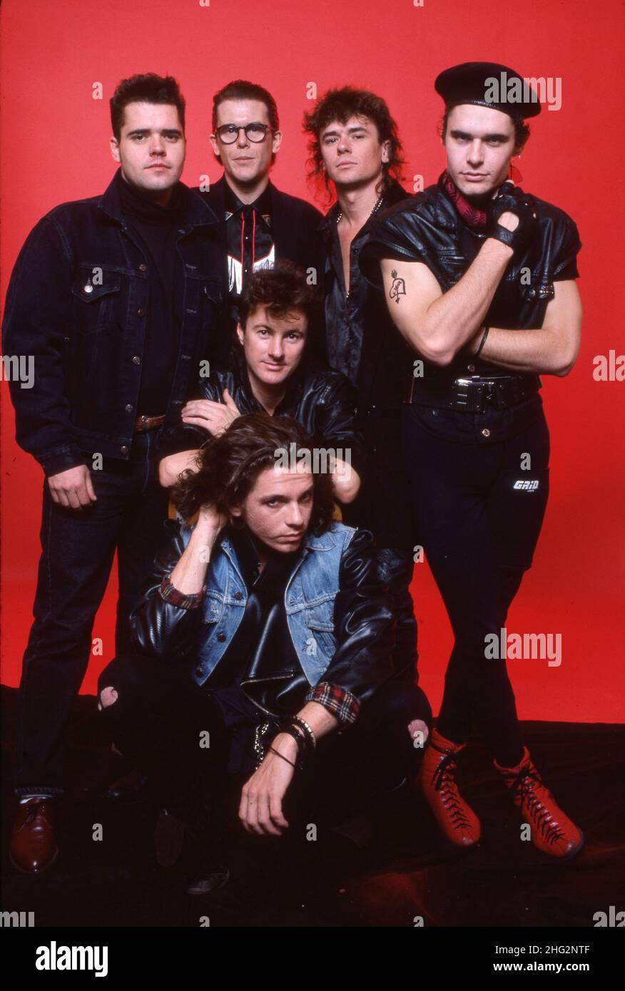 ANN ARBOR, MI - FEBRUARY 11: (L-R) Keyboardist Andrew Farriss ...