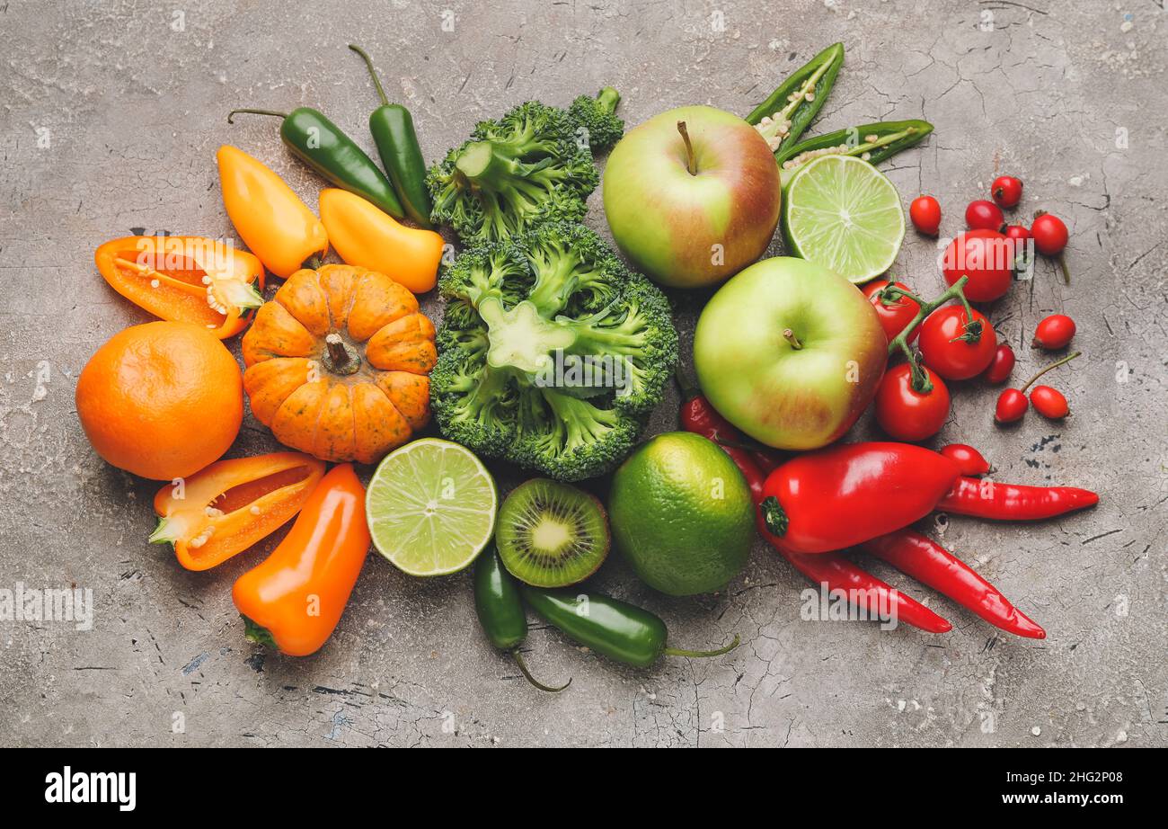Different healthy products on grey background Stock Photo - Alamy