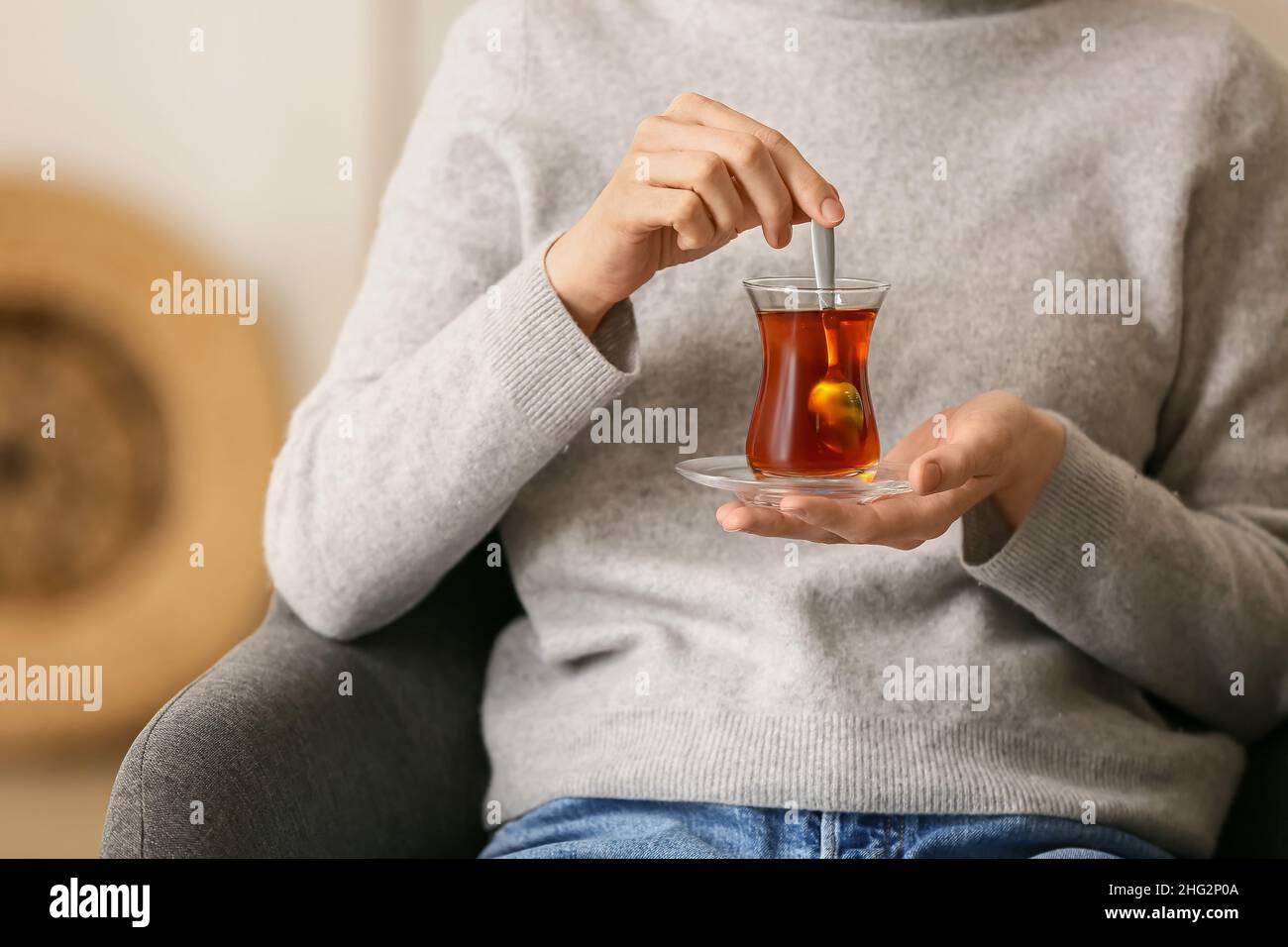 Woman drinking turkish tea hi-res stock photography and images - Alamy
