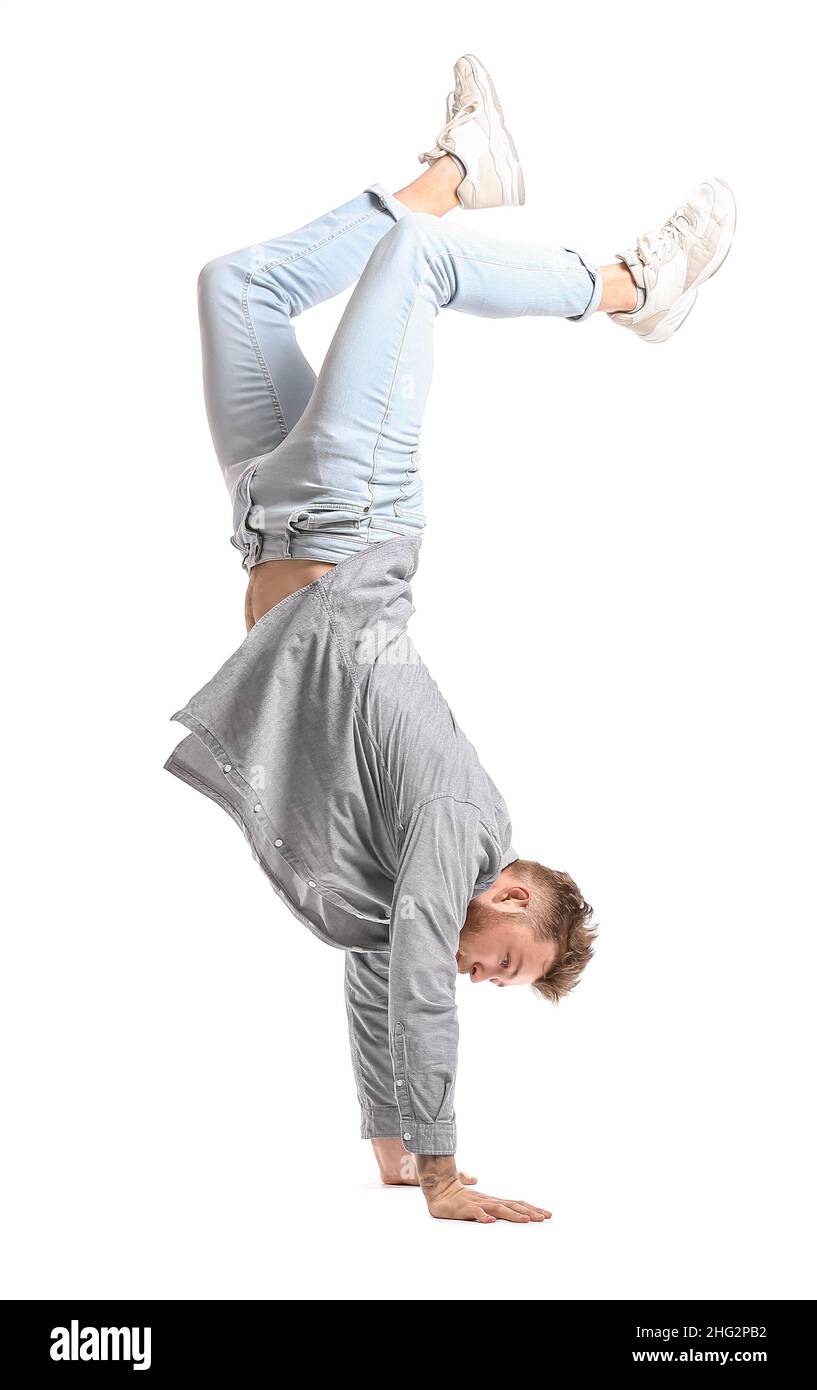 Cool dancing young man isolated on white Stock Photo - Alamy