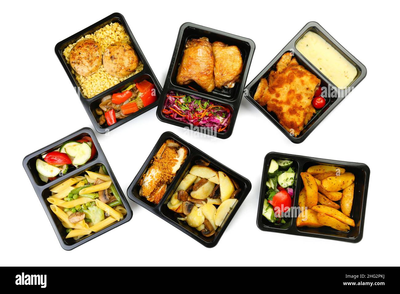 Different tasty food in lunch boxes on white background Stock Photo - Alamy