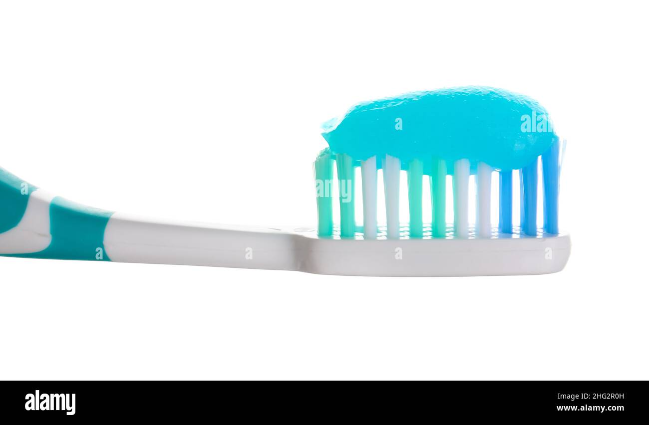 Toothbrush with paste on white background, closeup Stock Photo - Alamy