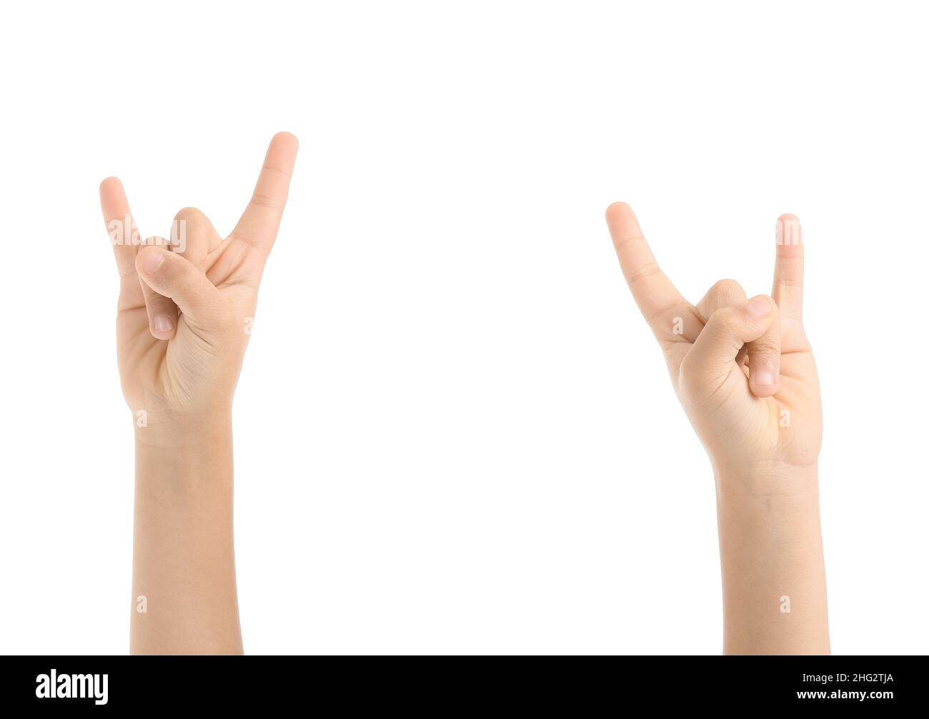 Child showing "devil horns" on white background Stock Photo - Alamy