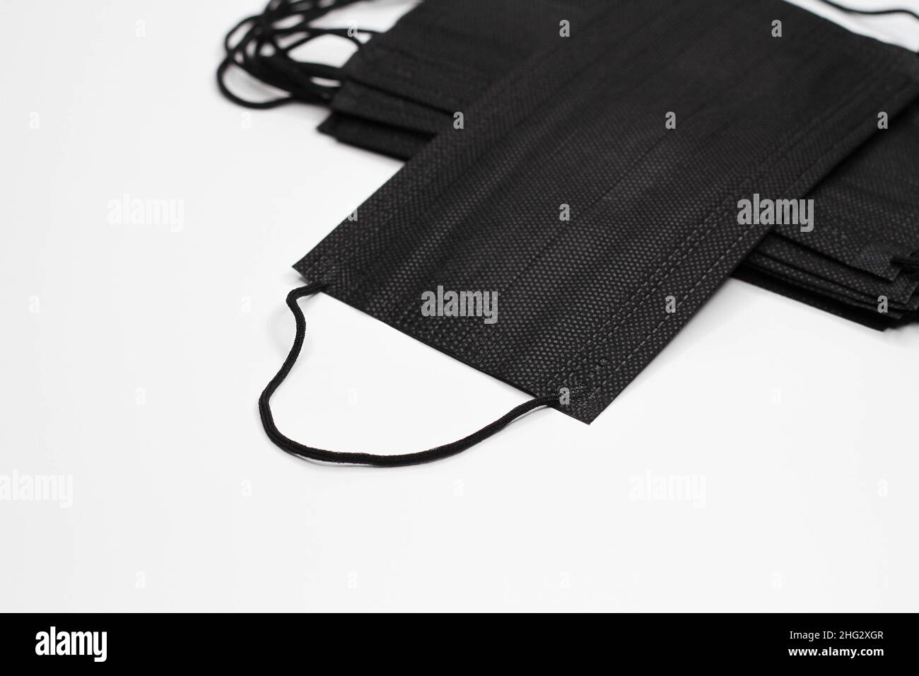 Black mask. Face mask against the virus. Black medical bandage for ...